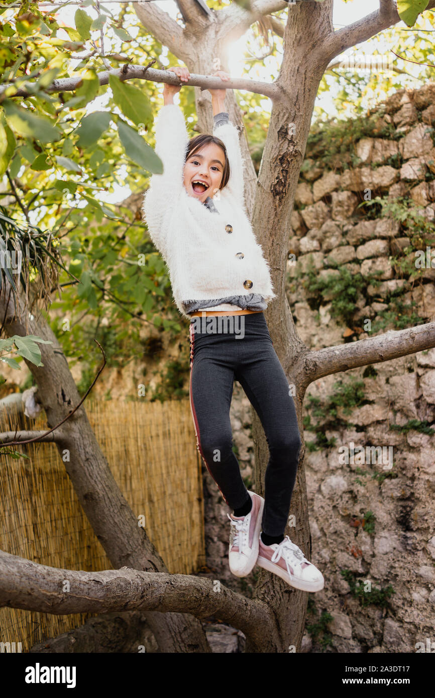 Girls Hanging From Tree High Resolution Stock Photography and Images ...