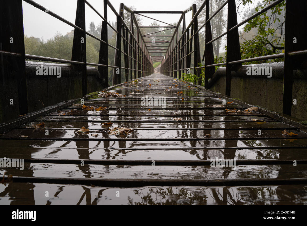 Metal bridge in the rain from bottom angle Stock Photo - Alamy