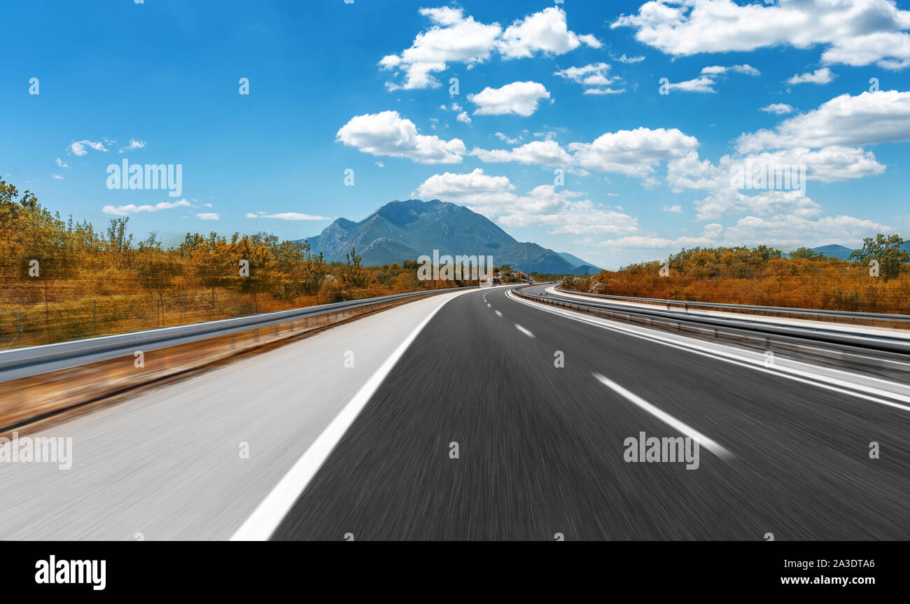 High-speed highway in mountainous terrain Stock Photo - Alamy
