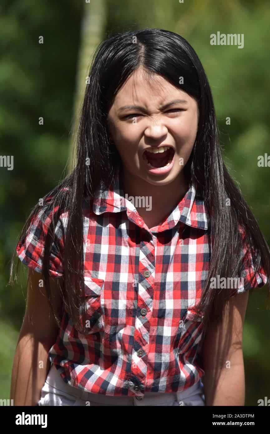 A Pretty Filipina Female Shouting Stock Photo - Alamy
