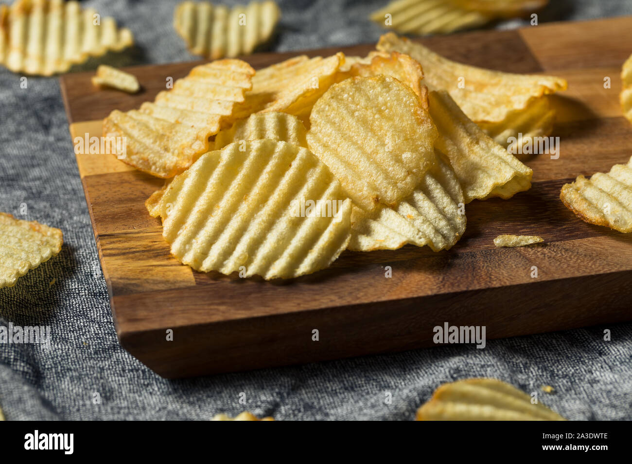 Organic Salted Wavy Potato Chips Ready to Eat Stock Photo - Alamy