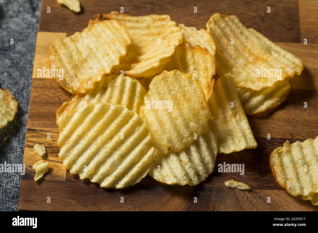 Organic Salted Wavy Potato Chips Ready to Eat Stock Photo - Alamy