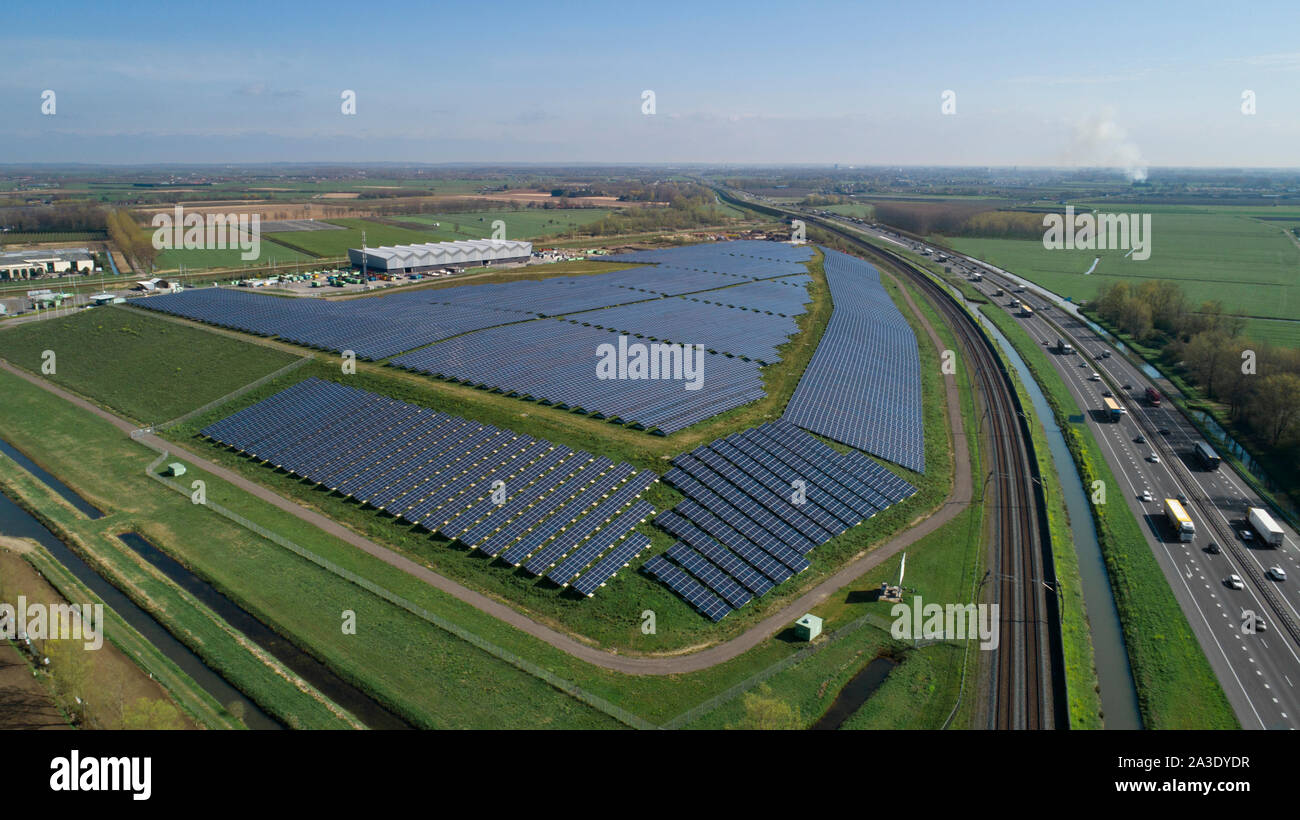 Modern Solar panel farm with photovoltaic panels for clean solar energy ...