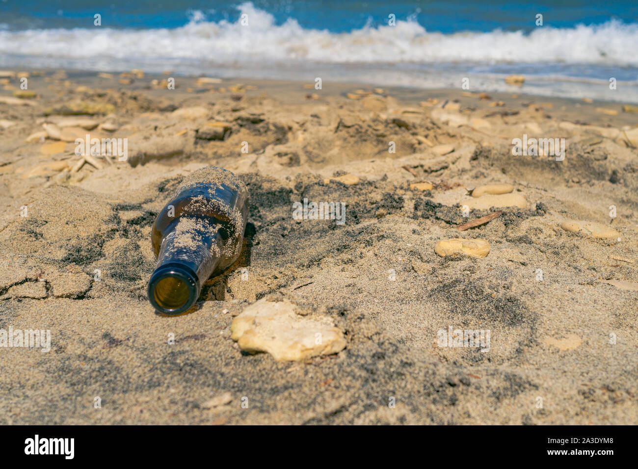 waving sea became the background of after party's trash abandoned on ...