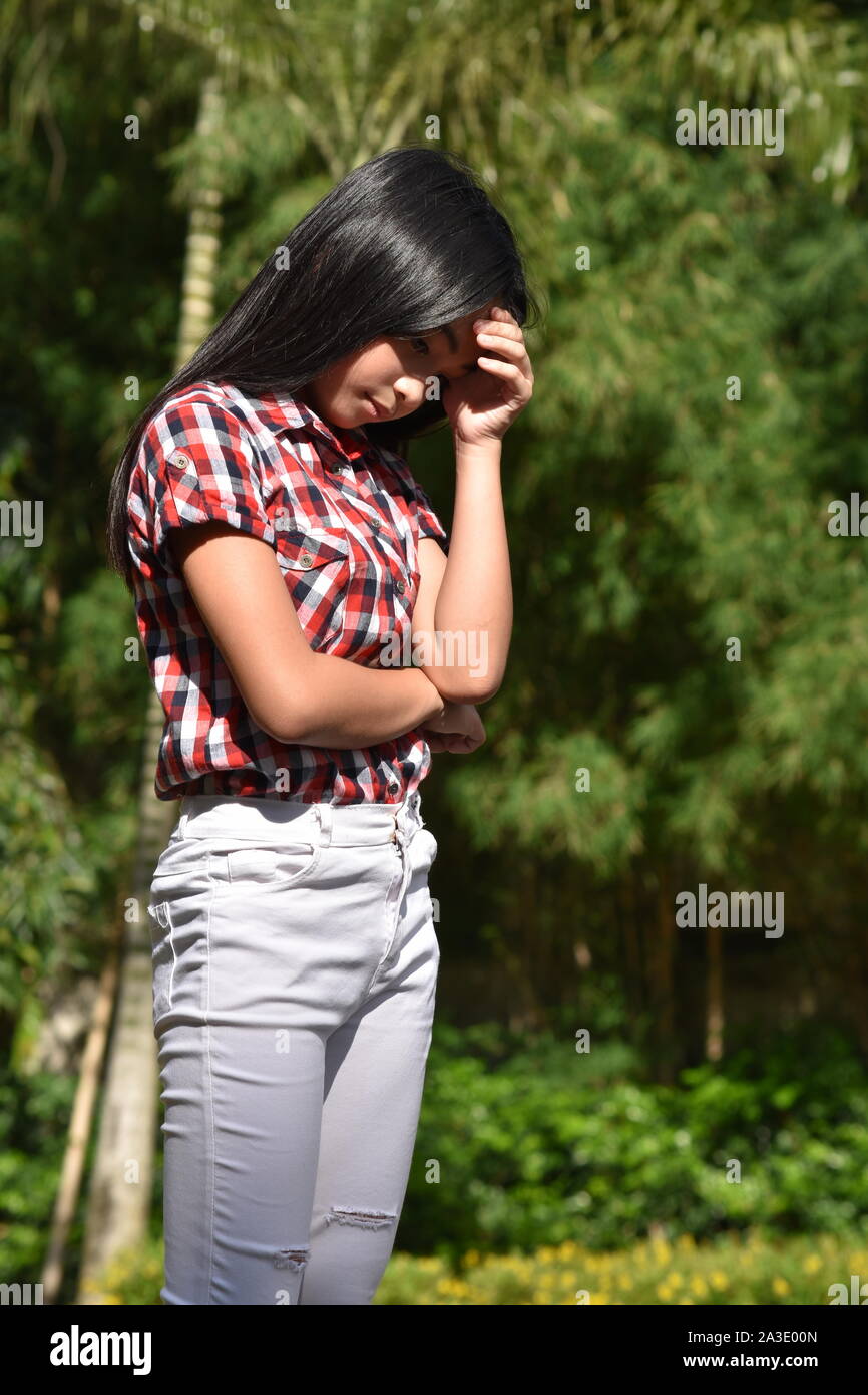 A Worried Filipina Preteen Stock Photo - Alamy