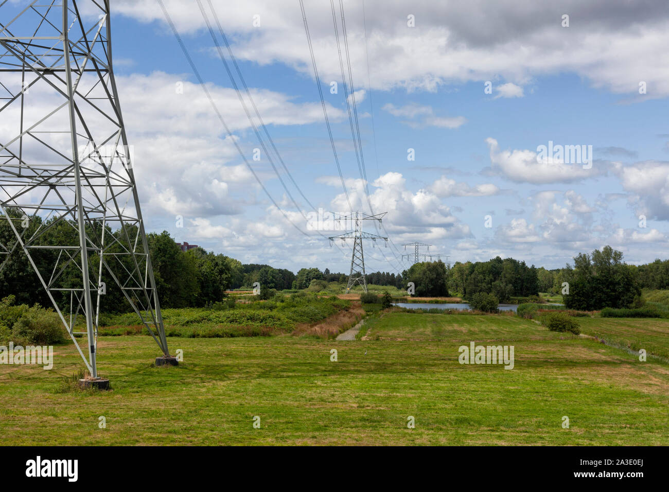 Electrical Transmission Towers and beautiful nature landscape Stock ...