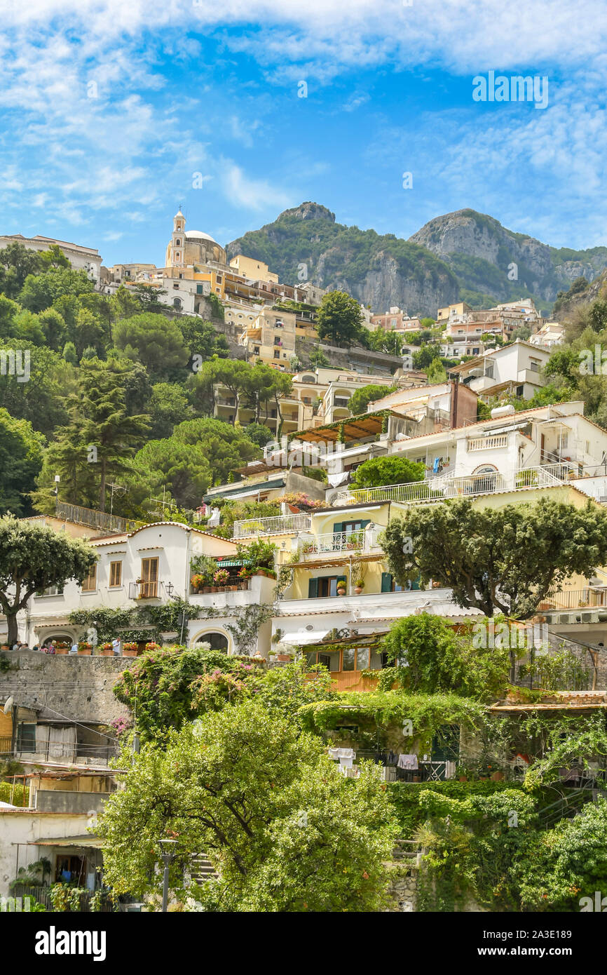 POSITANO, ITALY - AUGUST 2019: Scenic view of homes set into the steep ...