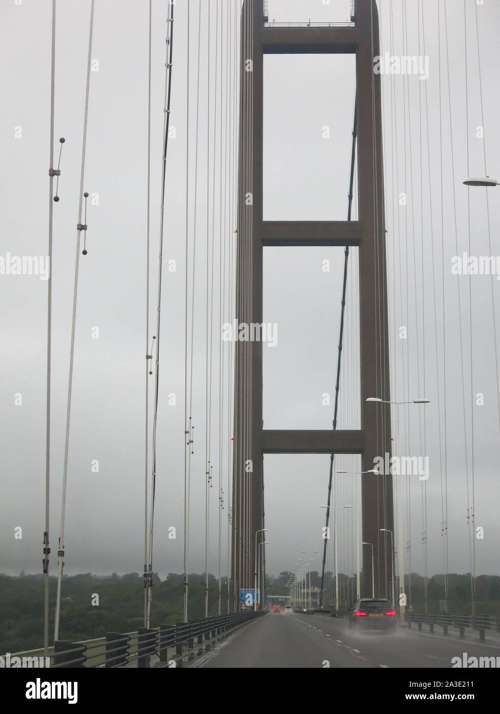 Driving along the Humber Bridge on a grey rainy day, the A15 that ...