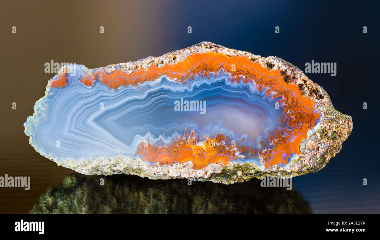 Polished agate cross-section. Beautiful wavy pattern on smooth cut ...