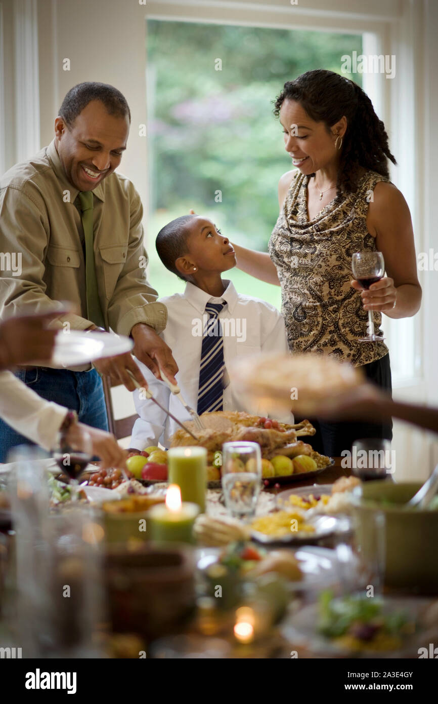 Young boy between mother and father hi-res stock photography and images ...