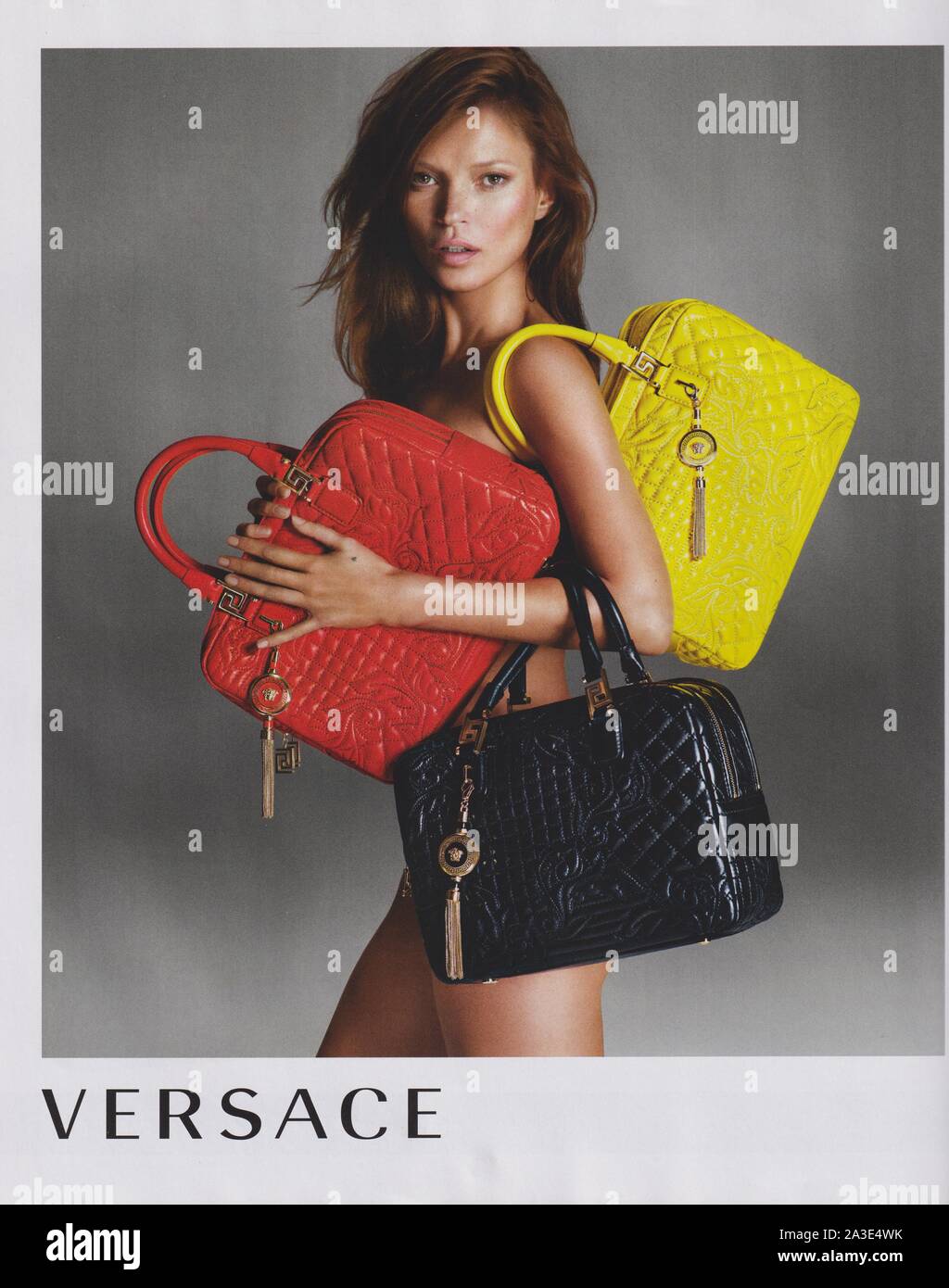 poster advertising VERSACE fashion house with Kate Moss in paper ...