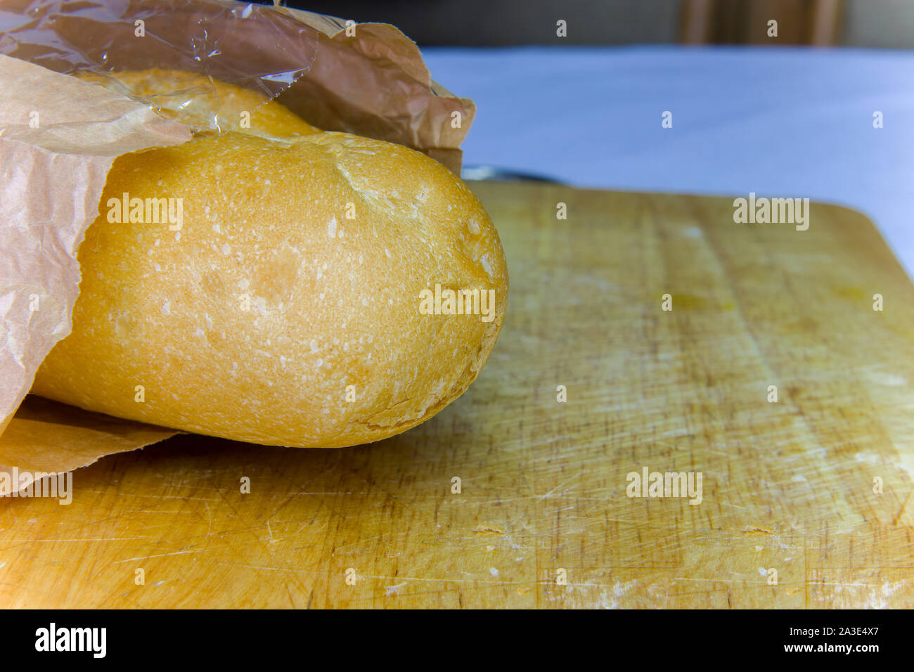 Fresh Baguette in a paper bag closeup copy space.High resolution image ...