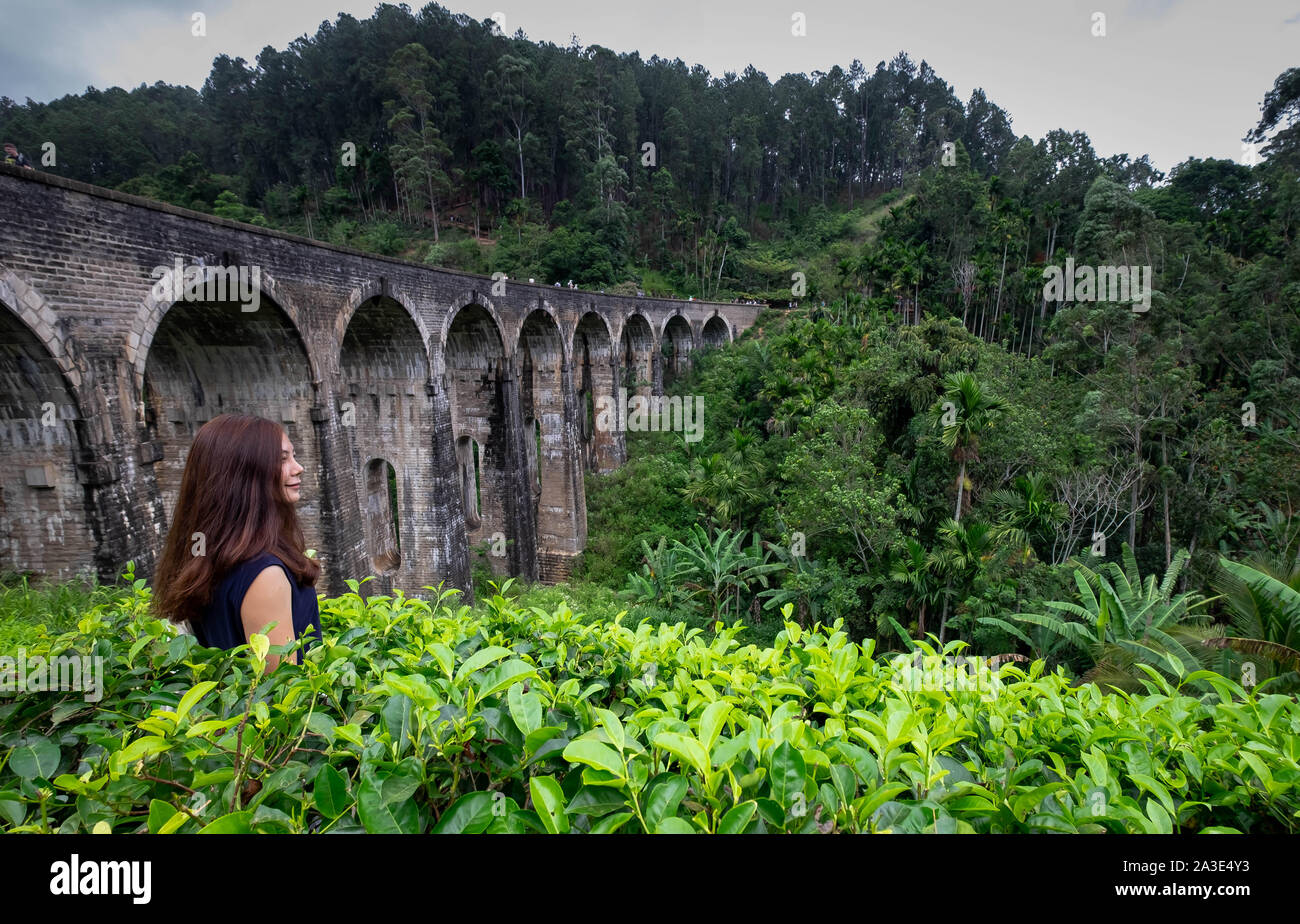 ELLA/ DEMODARA, SRI-LANKA: AUGUST 08/ 2019: Unspecific woman looking at ...