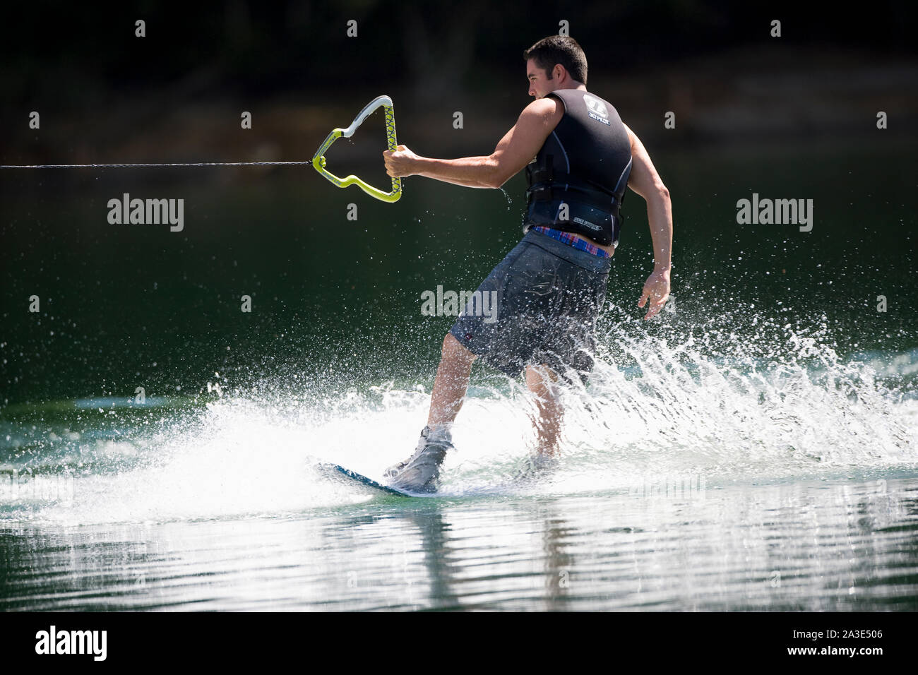 Back view of young man wakeboarding hi-res stock photography and images ...
