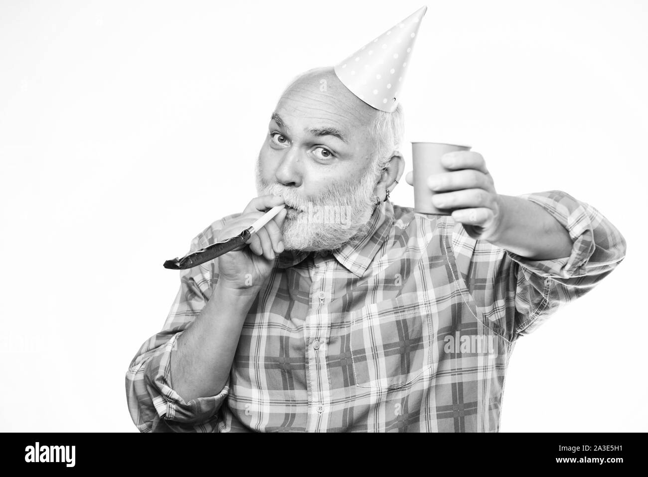 happy man with beard. retirement party. man hold party cone hat and ...
