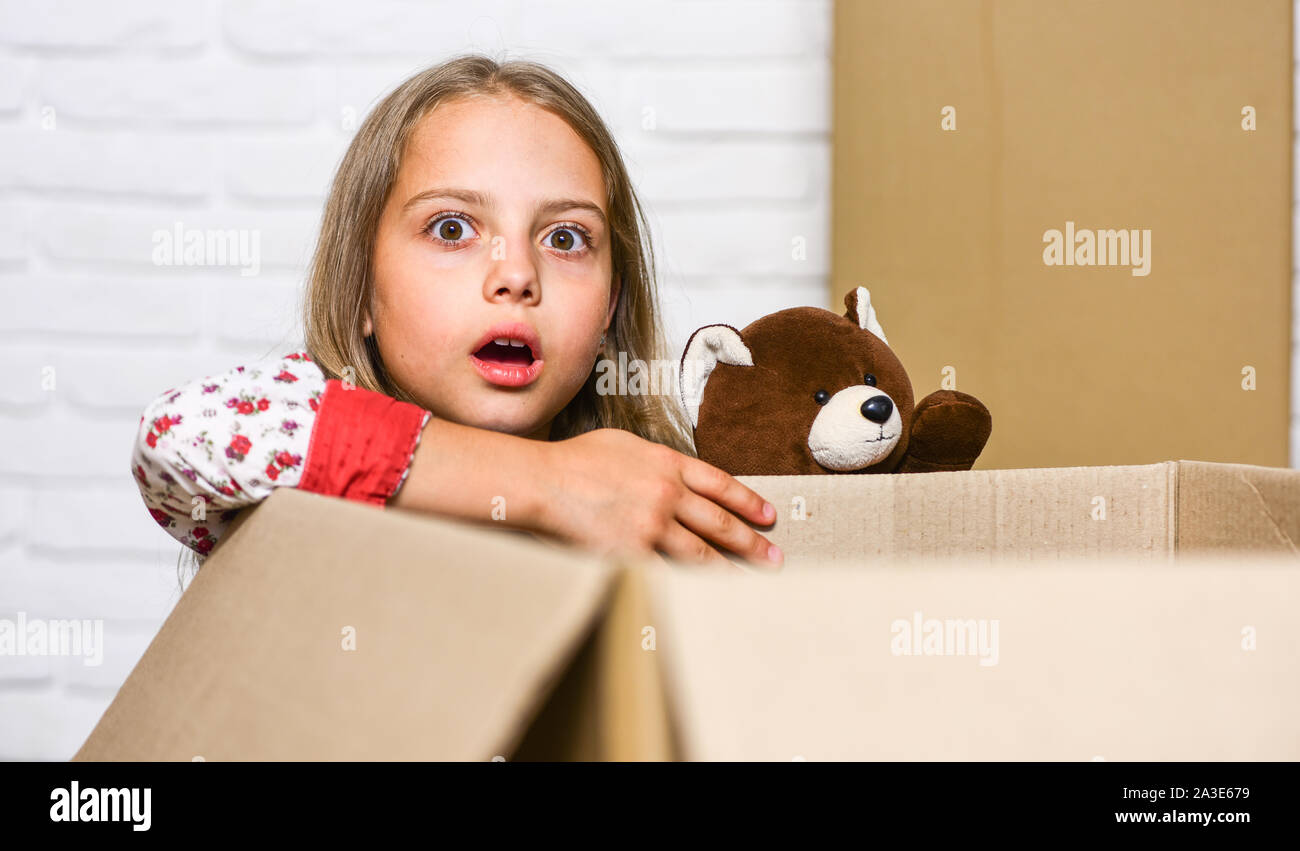 feeling scared. happy child cardboard box. purchase of new habitation ...