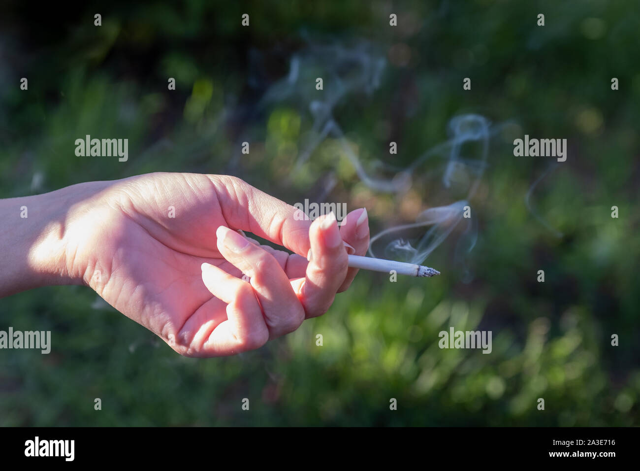 Smoldering cigarette hi-res stock photography and images - Alamy