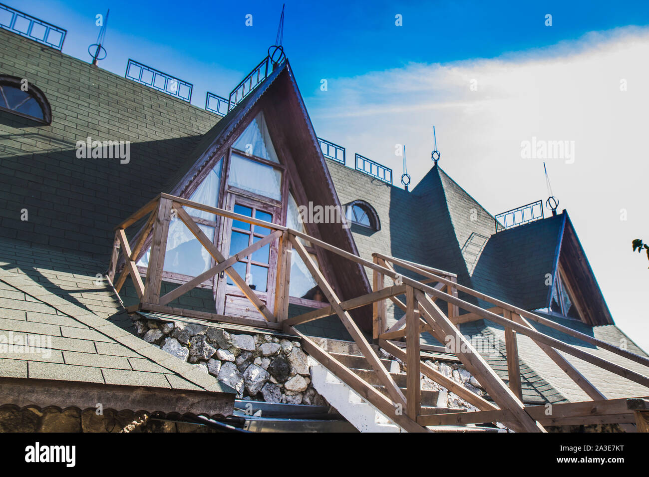 Modern photo of a rural rustic facade balcony of a stylish cottage ...