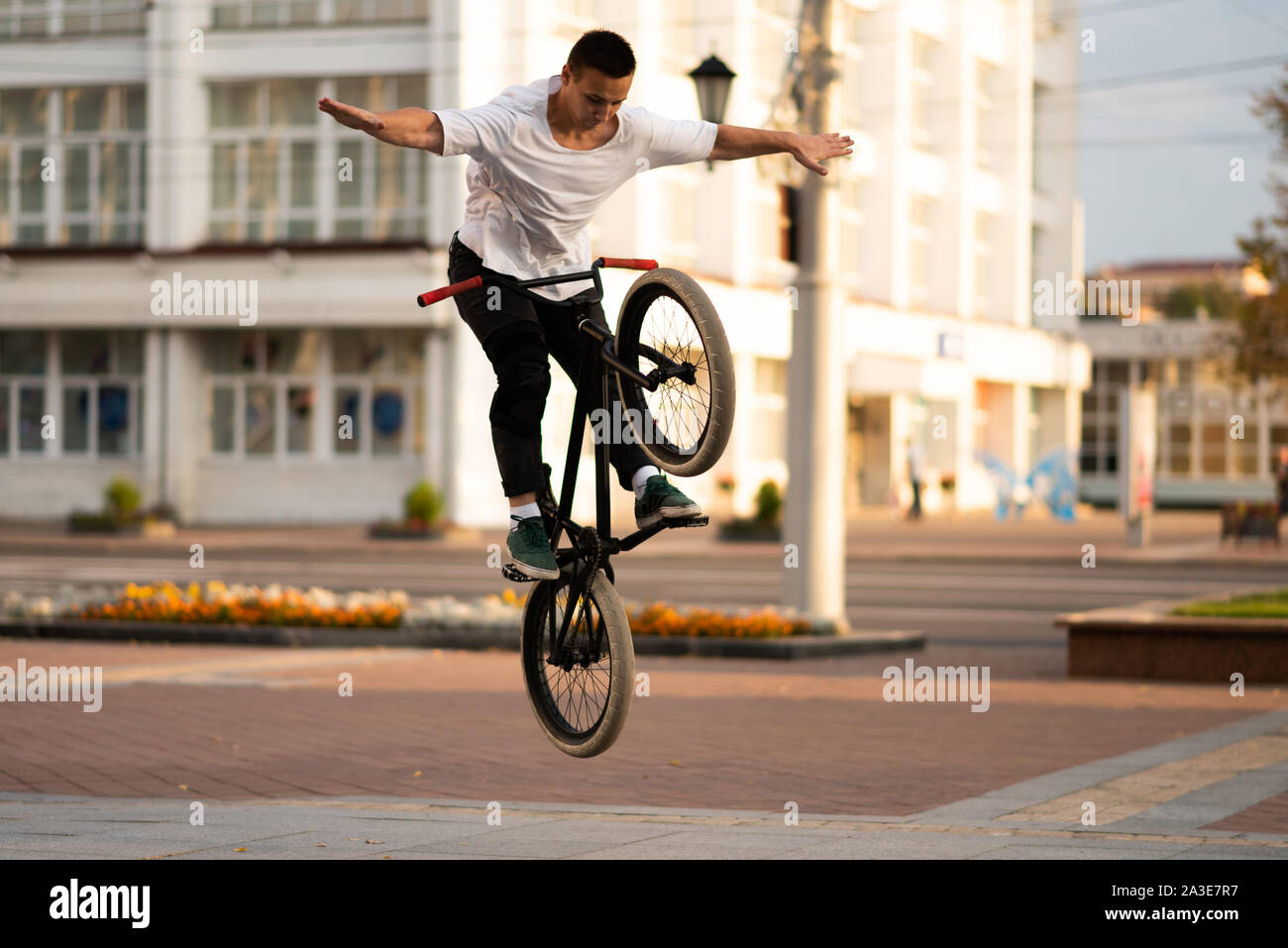 The guy on the BMX bike, releases his hands in a jump Stock Photo - Alamy