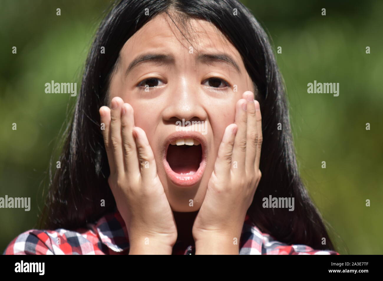 A Shocked Female Tween Stock Photo - Alamy
