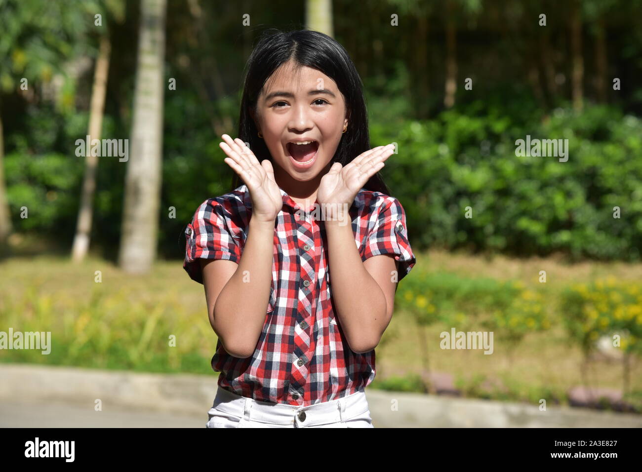 Cute asian girl surprised hi-res stock photography and images - Alamy