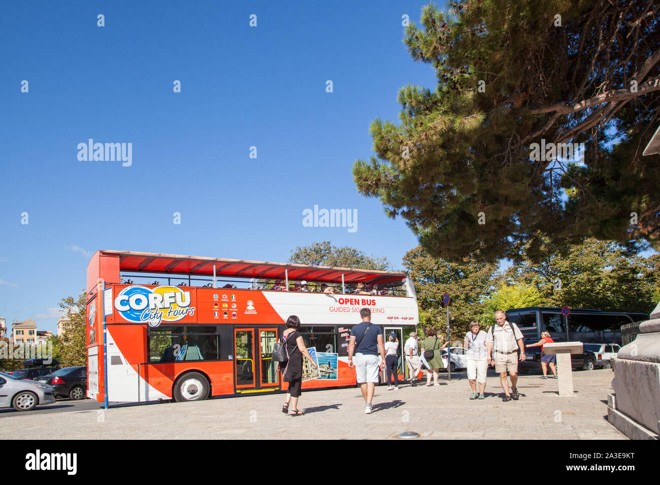 people getting on and off a sightseeing open top hop on hop off double ...