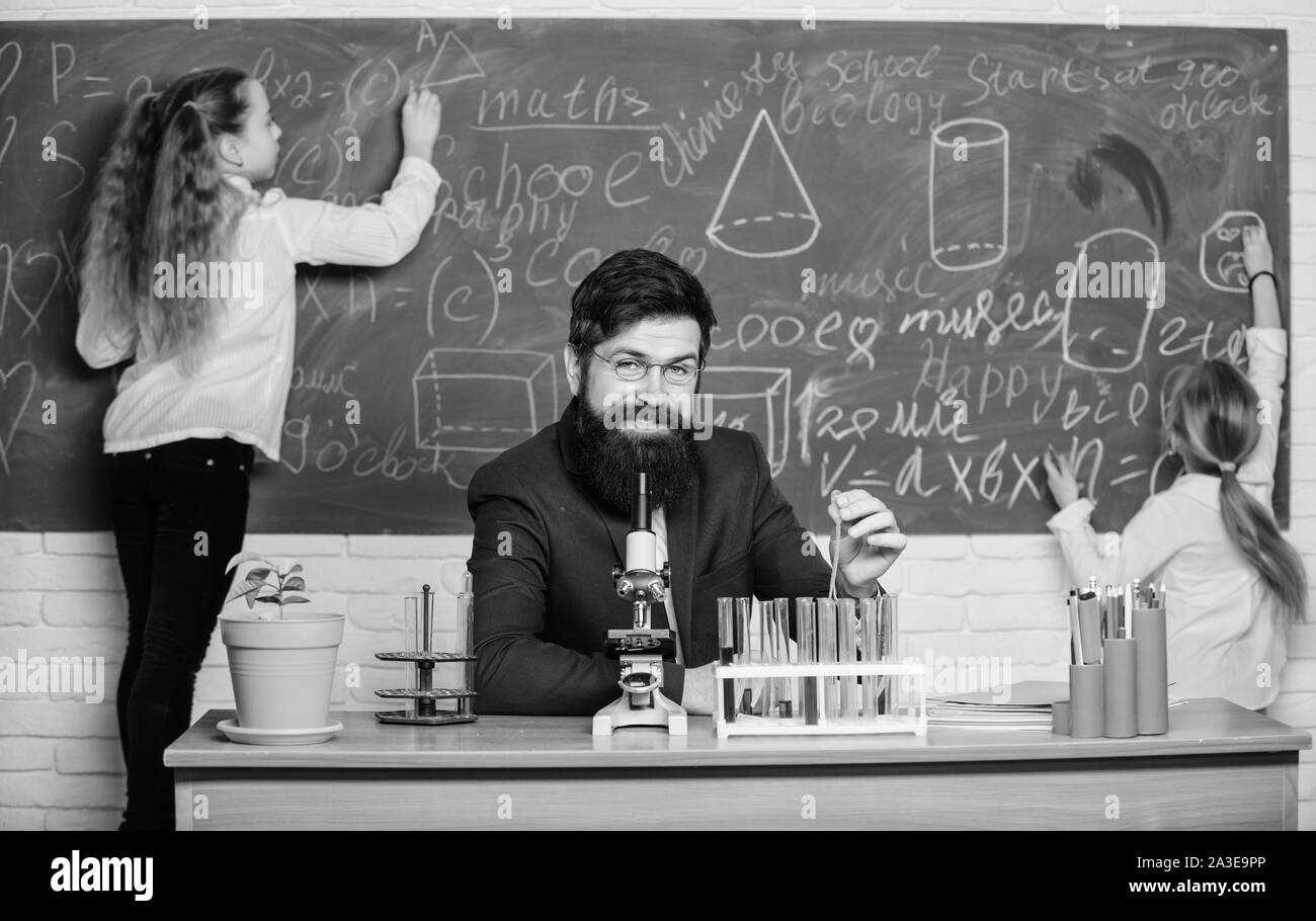 Study for a test. School teacher and study group. Little children and ...