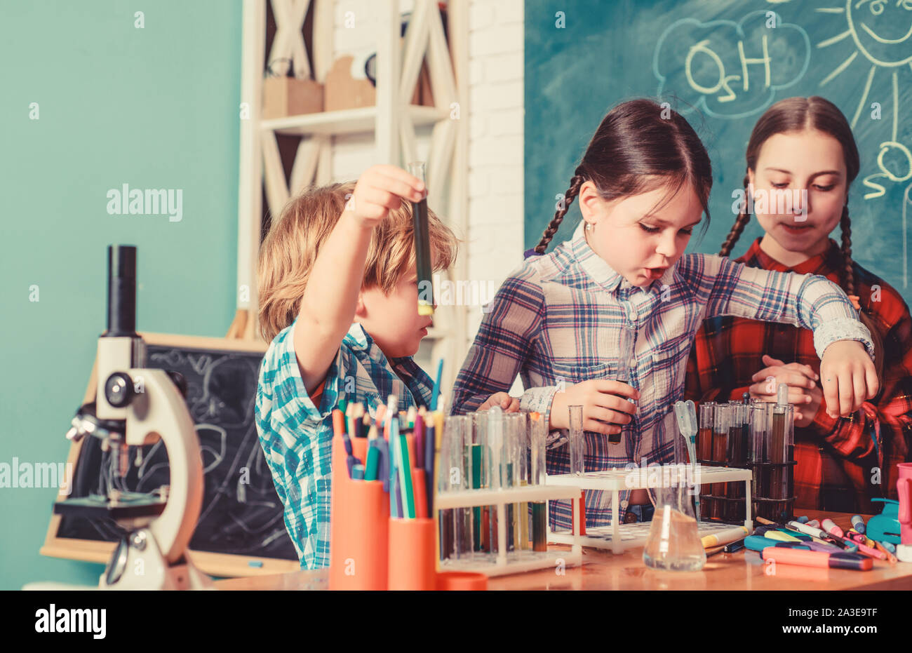 back to school. Educational. children scientists making experiments in ...