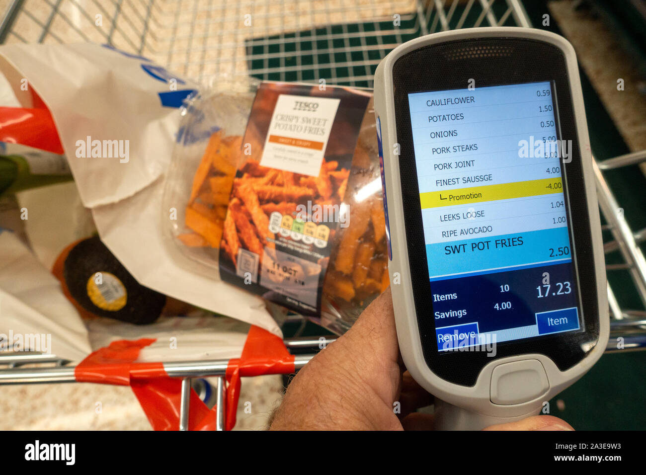 Food in supermarket shopping trolly with Scan as you shop handset Stock ...