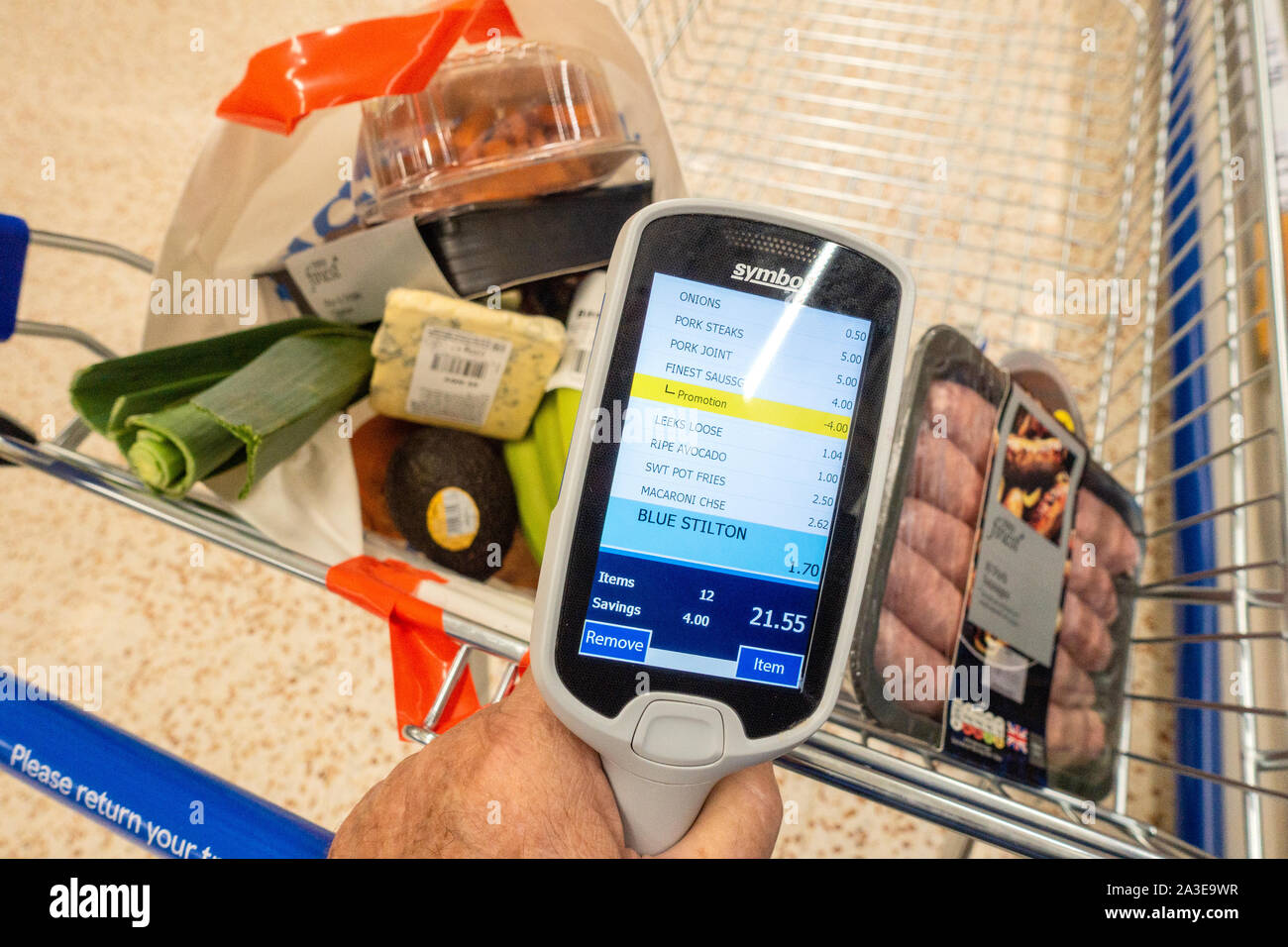 Food in supermarket shopping trolly with Scan as you shop handset Stock ...