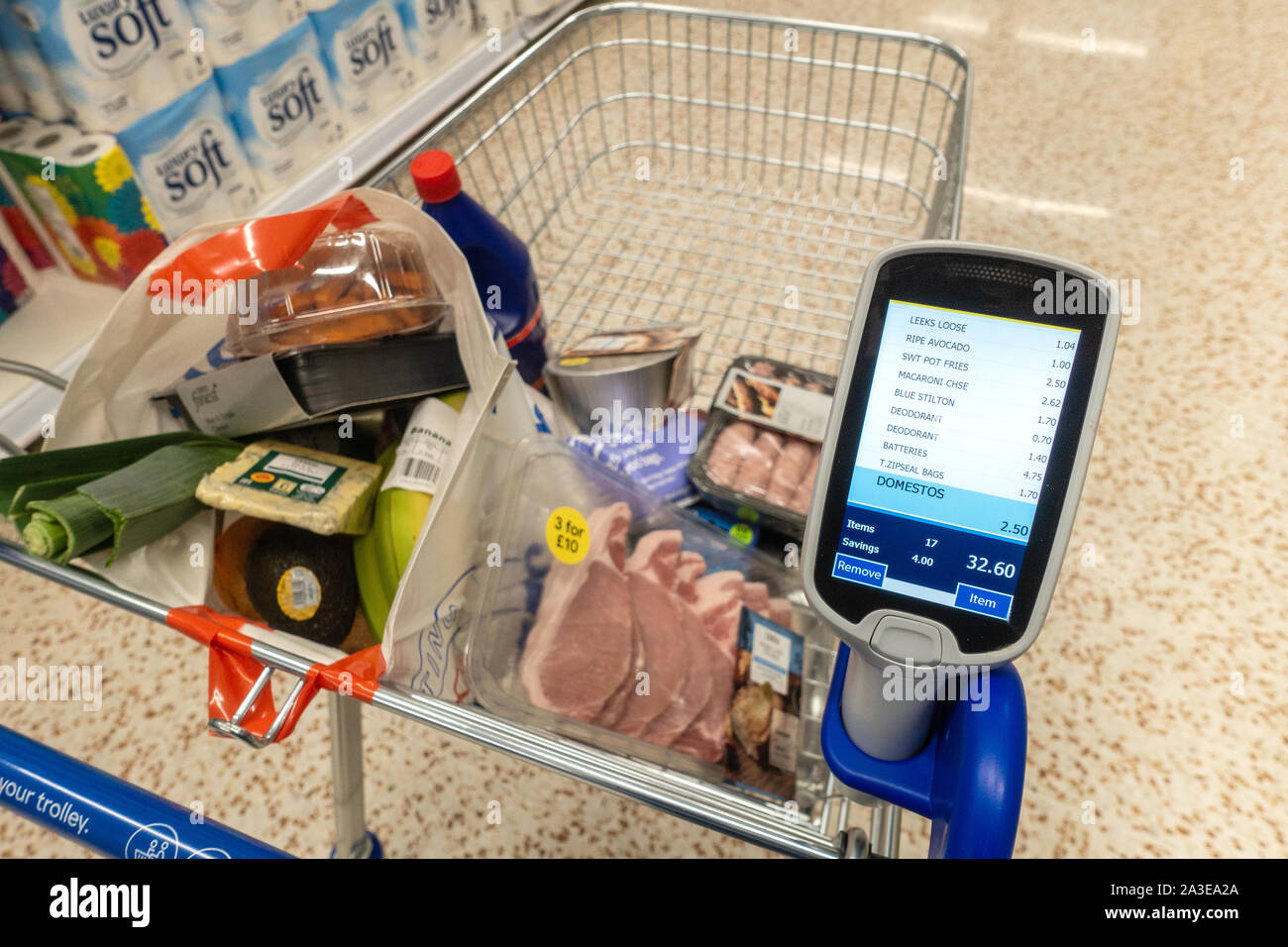 Food in supermarket shopping trolly with Scan as you shop handset Stock ...