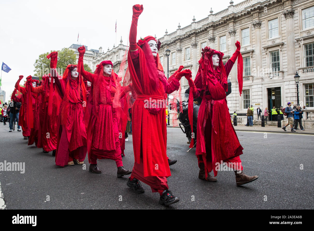 London, UK. 7 October, 2019. Red Brigade climate activists from ...