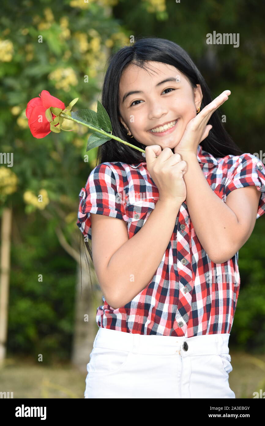 Girl roses hi-res stock photography and images - Alamy