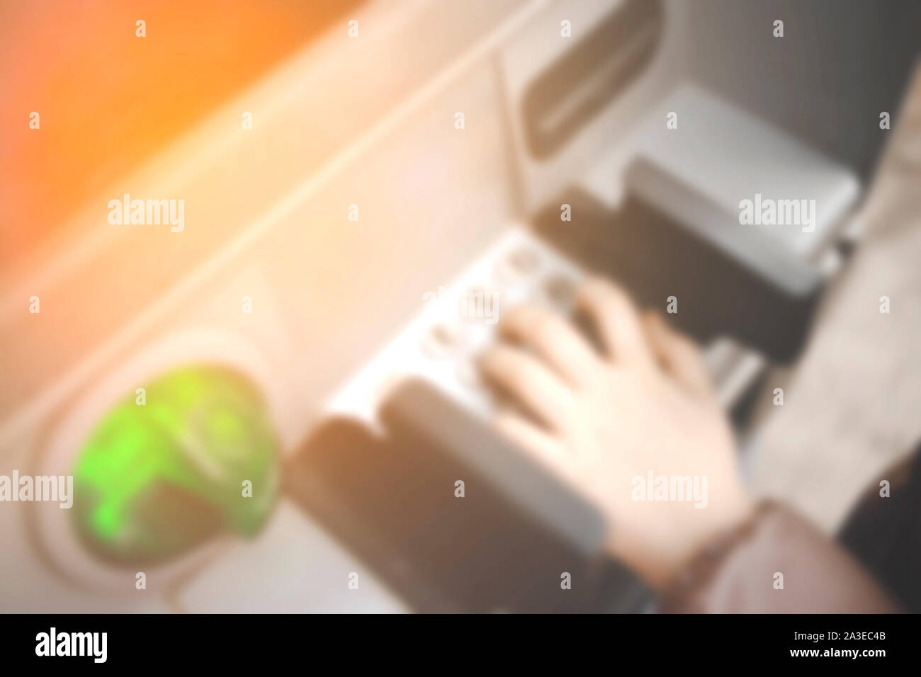 Little child , kid entering PIN numbers on ATM bank machine . Concept ...