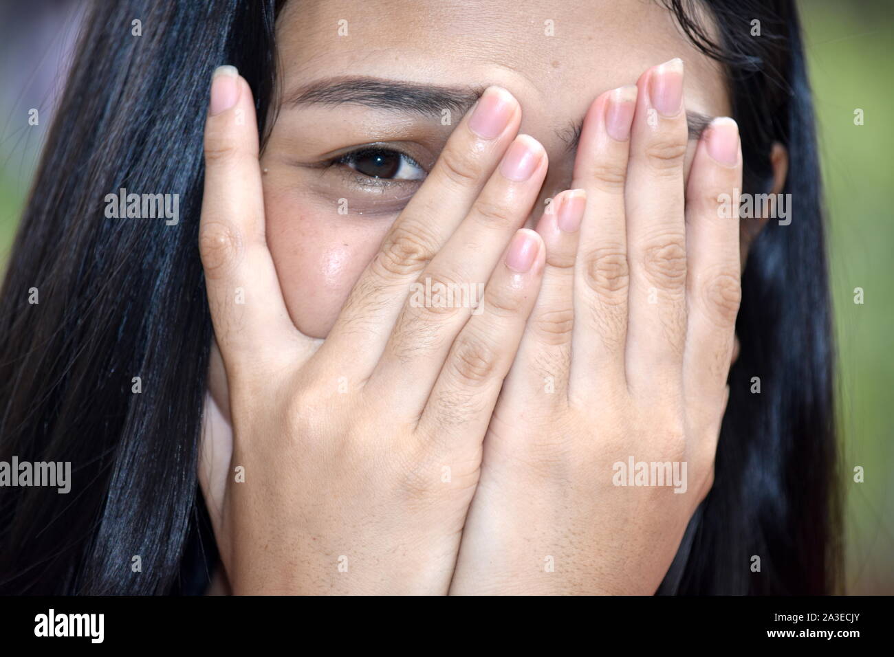 An Ashamed Adult Female Stock Photo - Alamy