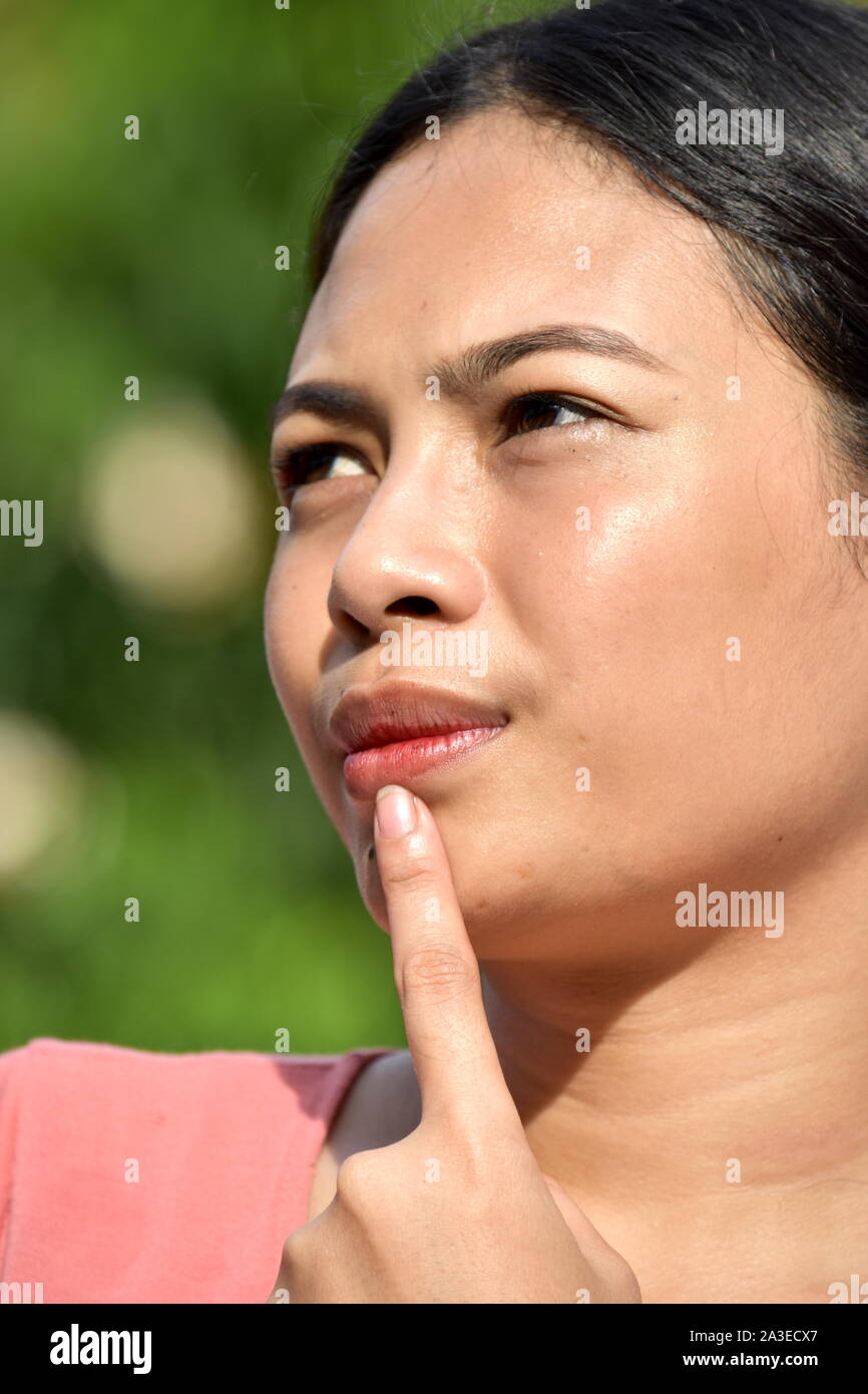A Thoughtful Female Woman Stock Photo - Alamy