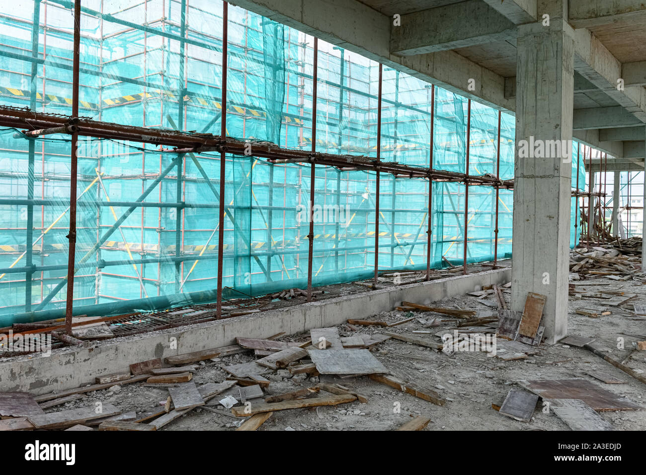 inside of an unfinished building with protection scaffolding and ...