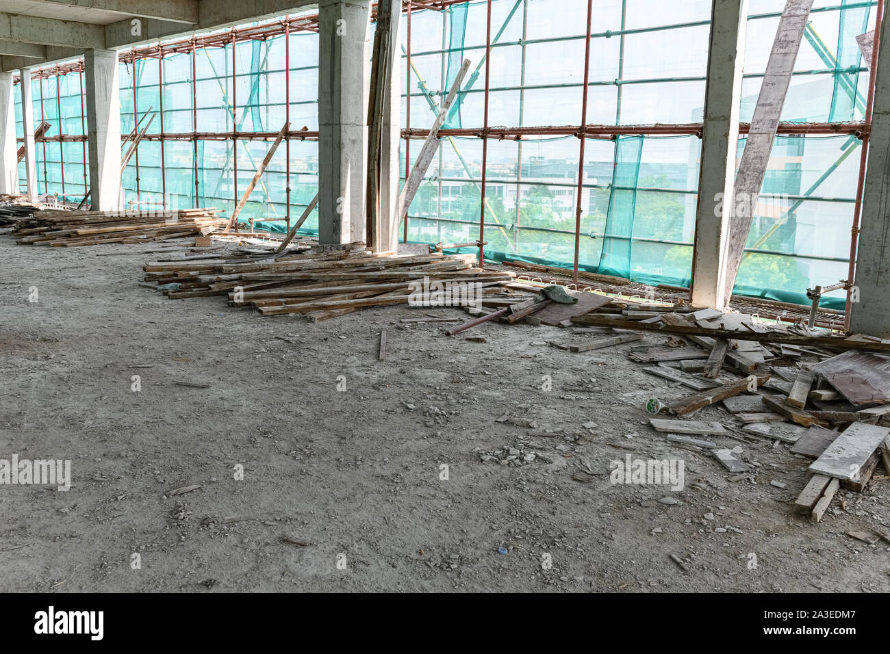 inside of an unfinished building with protection scaffolding and ...