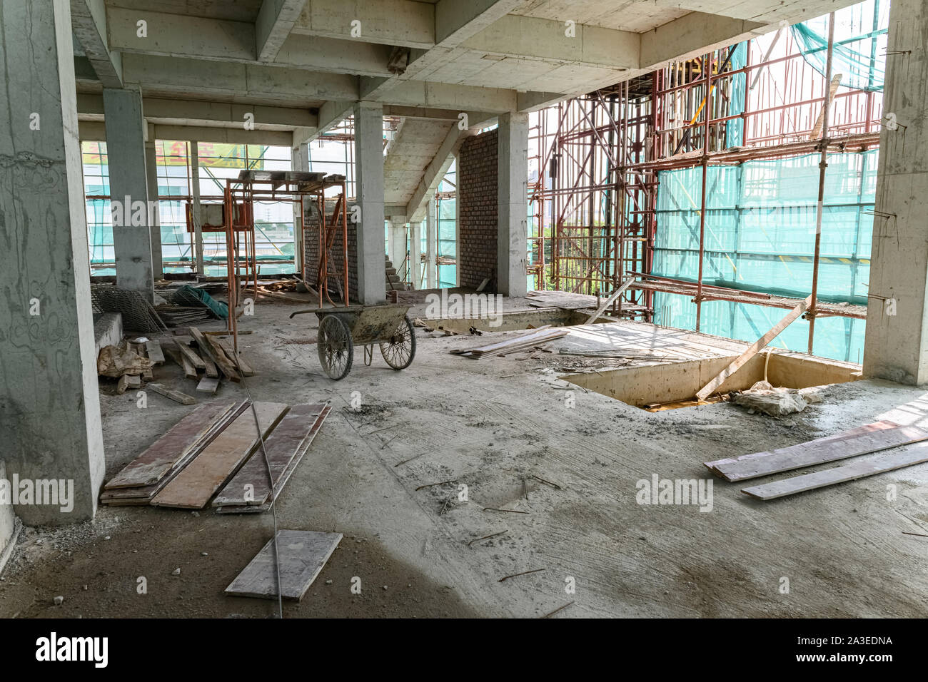 inside of an unfinished building with protection scaffolding and ...