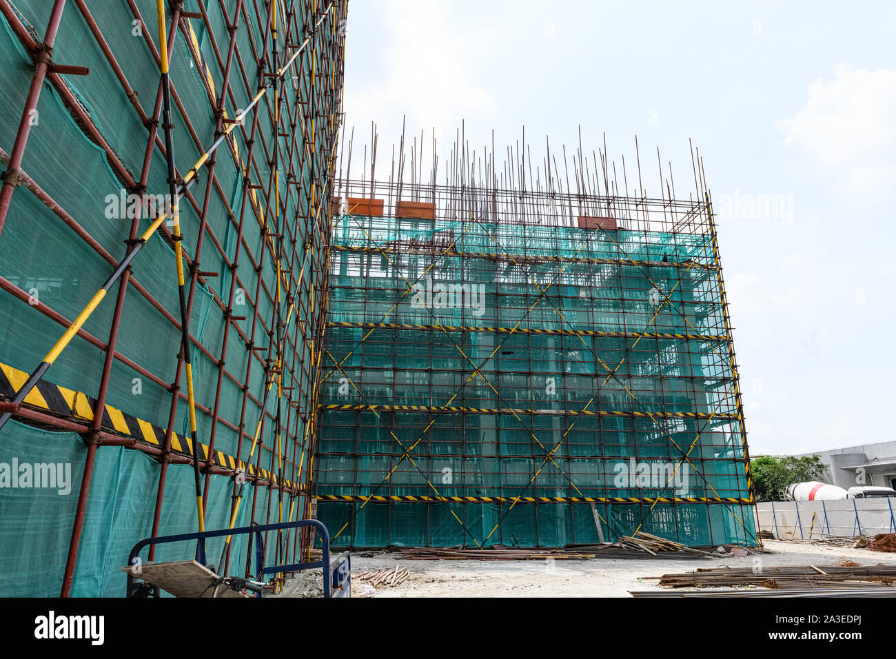 scaffolding and protection netting on an unfinished building Stock ...