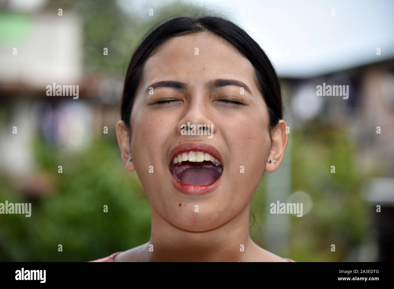 A Filipina Female Shouting Stock Photo - Alamy