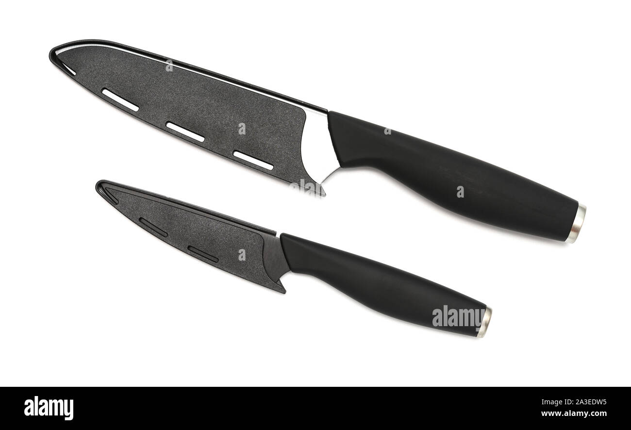two stainless steel knives with covers on white background Stock Photo ...