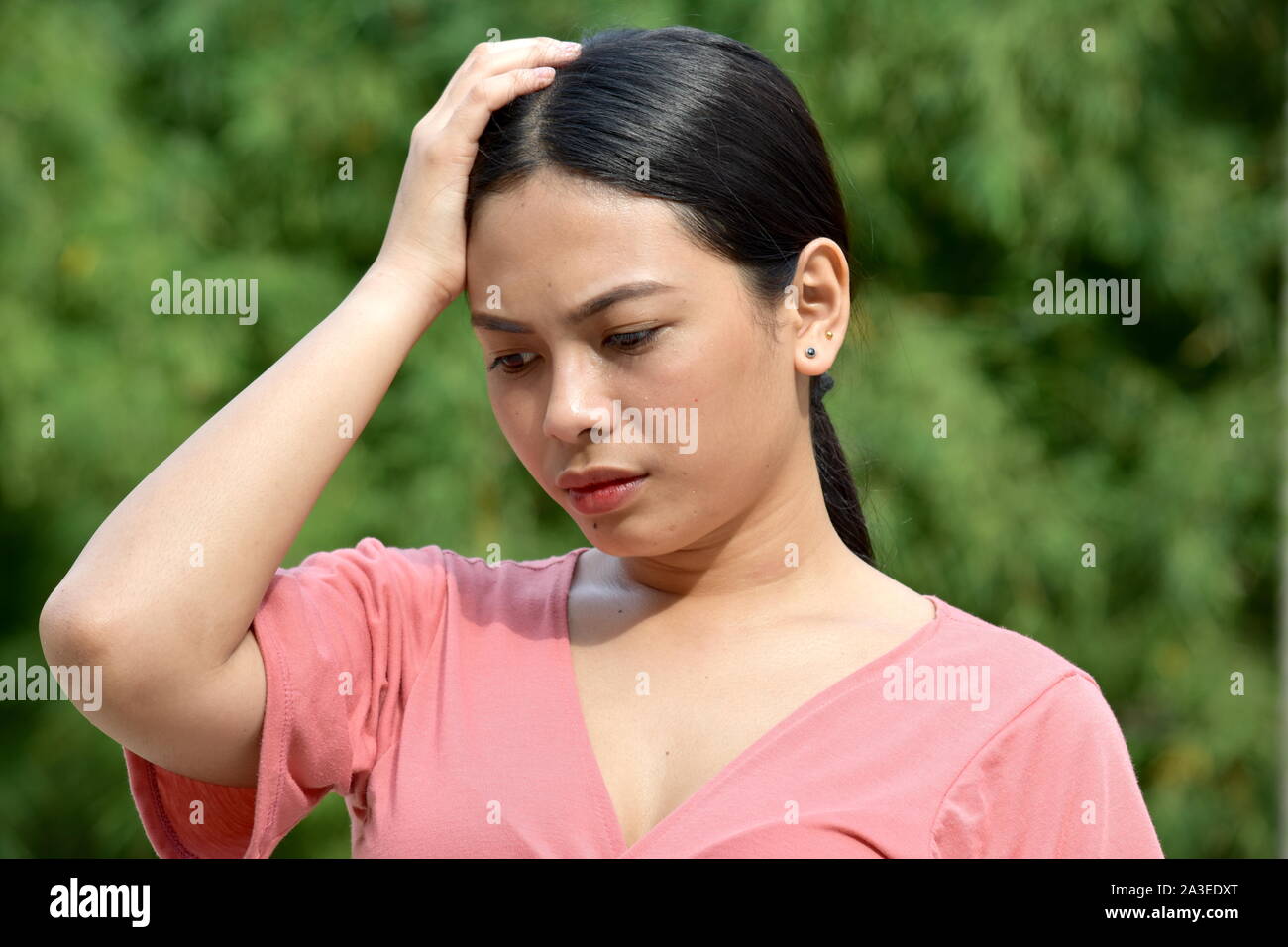 A Worried Beautiful Adult Female Stock Photo - Alamy