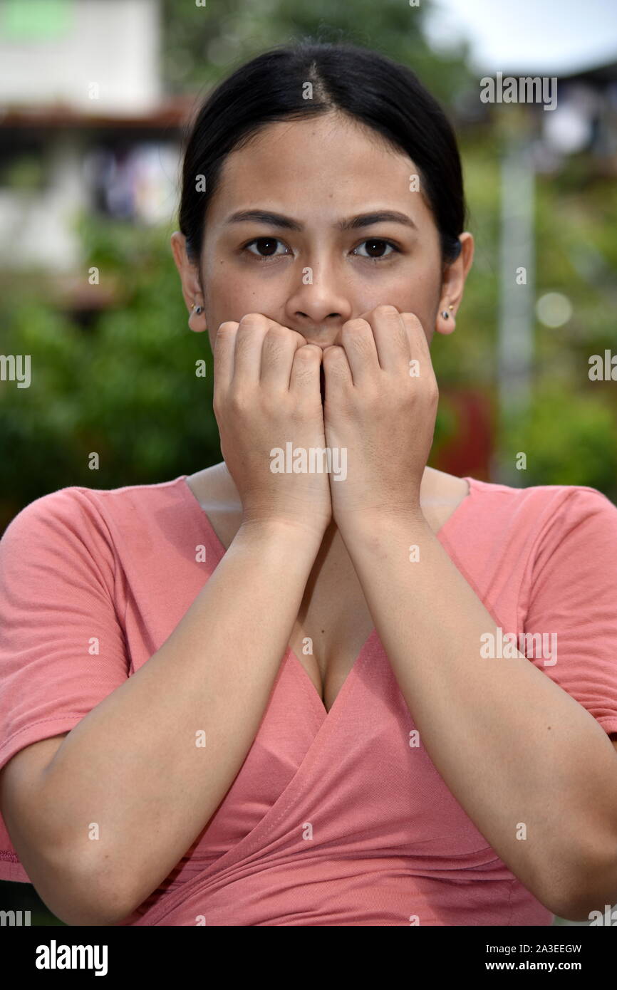 A Diverse Adult Female Afraid Stock Photo - Alamy