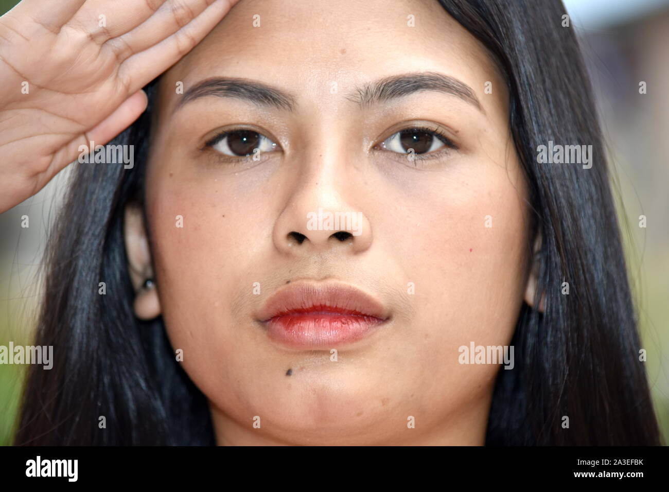 A Beautiful Female Saluting Stock Photo - Alamy