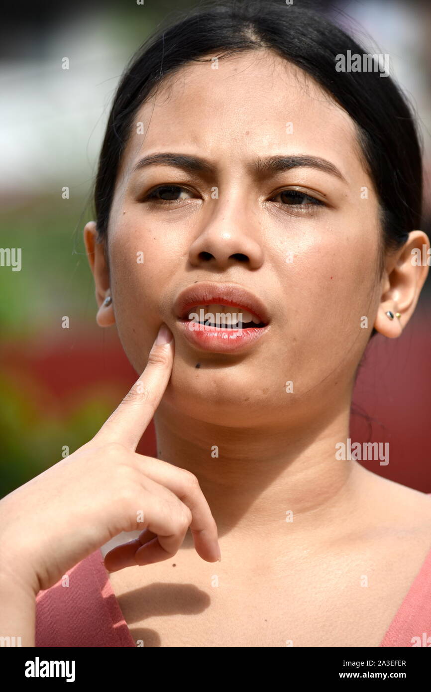 A Filipina Woman With Toothache Stock Photo - Alamy
