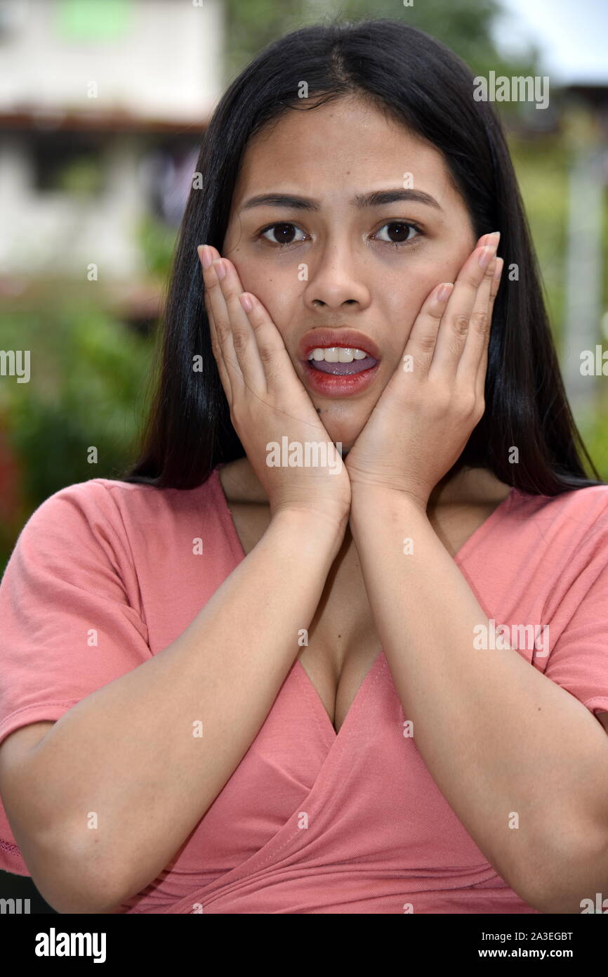 A Startled Youthful Female Woman Stock Photo - Alamy