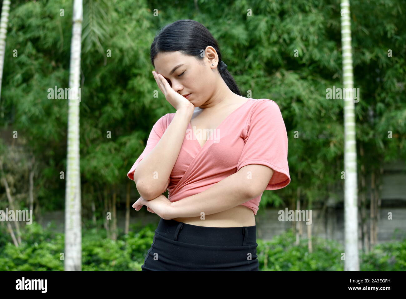 A Sleepy Pretty Asian Female Stock Photo - Alamy
