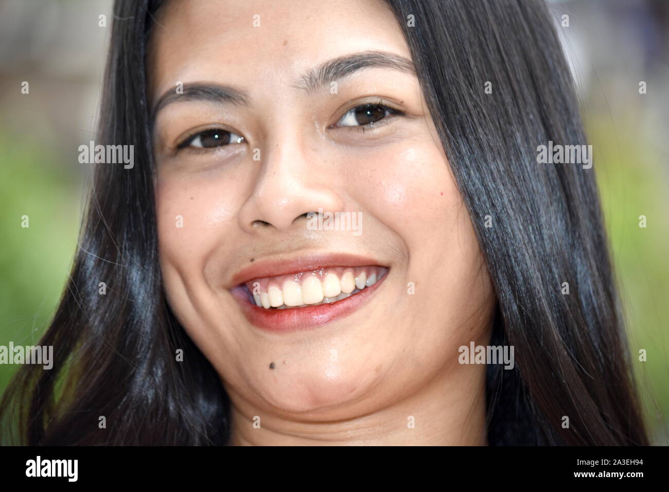 A Smiling Filipina Female Stock Photo - Alamy