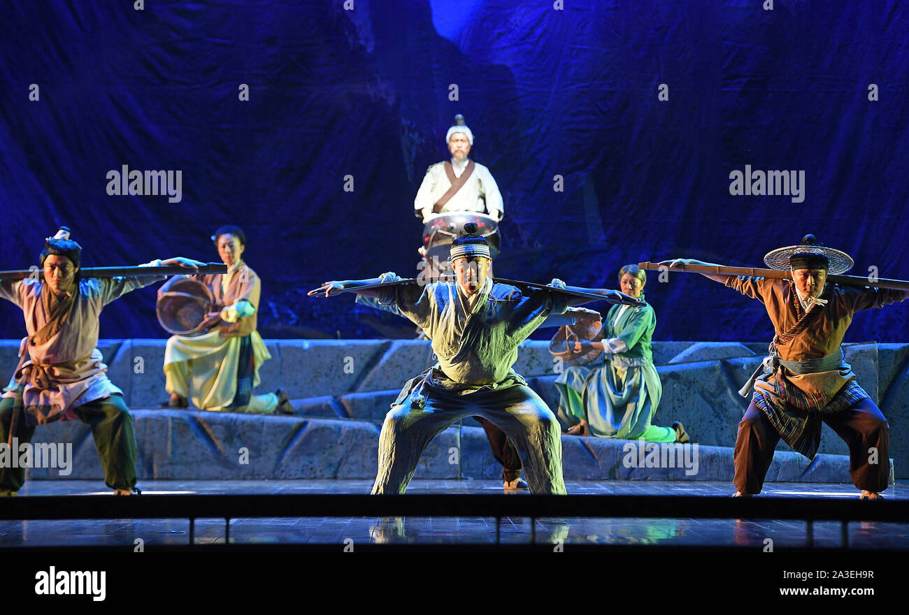 Beijing, China's Jiangxi Province. 6th Oct, 2019. Troupers perform a ...